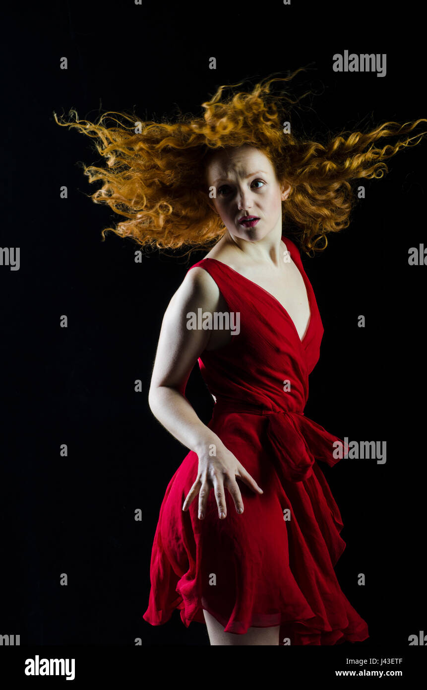 Woman running away fear hi-res stock photography and images - Alamy