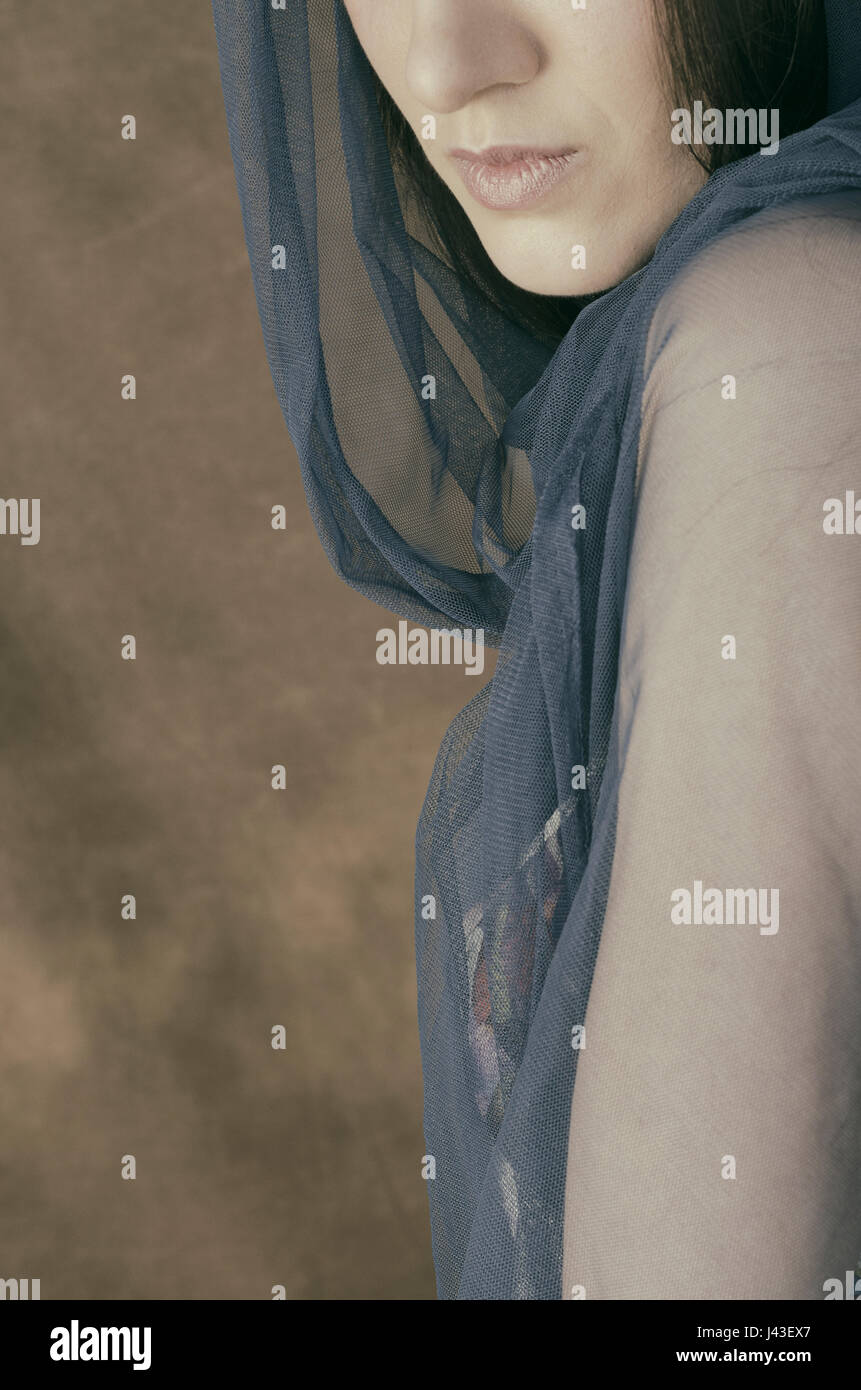 Close up of a veiled young woman Stock Photo - Alamy