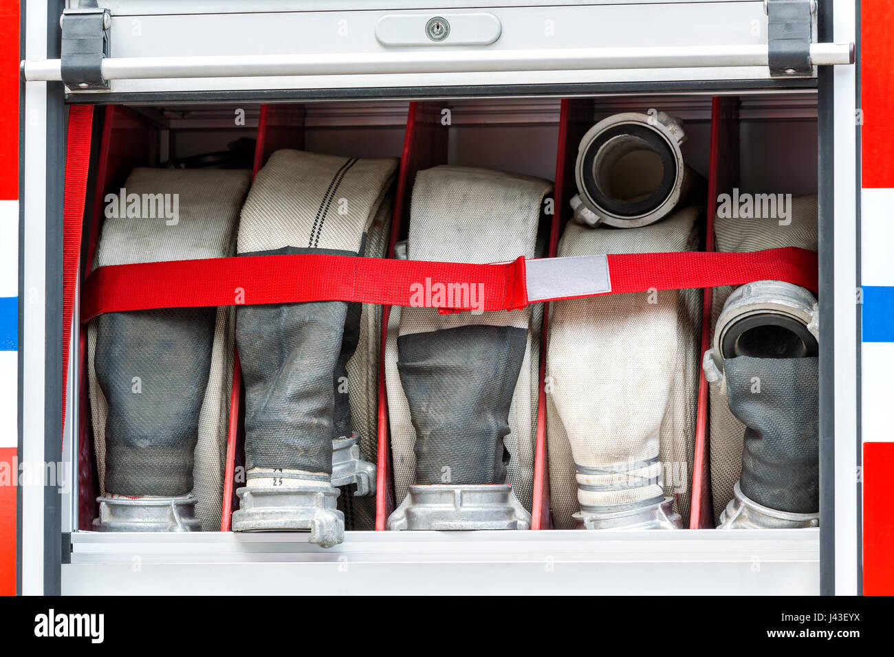 hoses on side of fire engine. rescue fire truck equipment Stock Photo ...