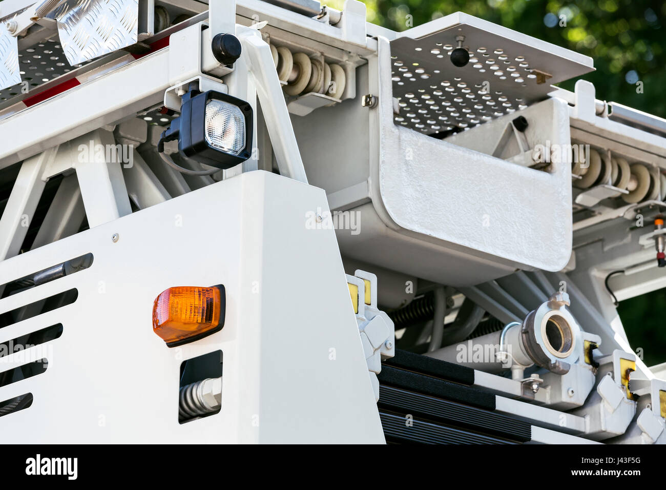 hydraulic ladder of fire engine. closeup details of rescue fire truck ...