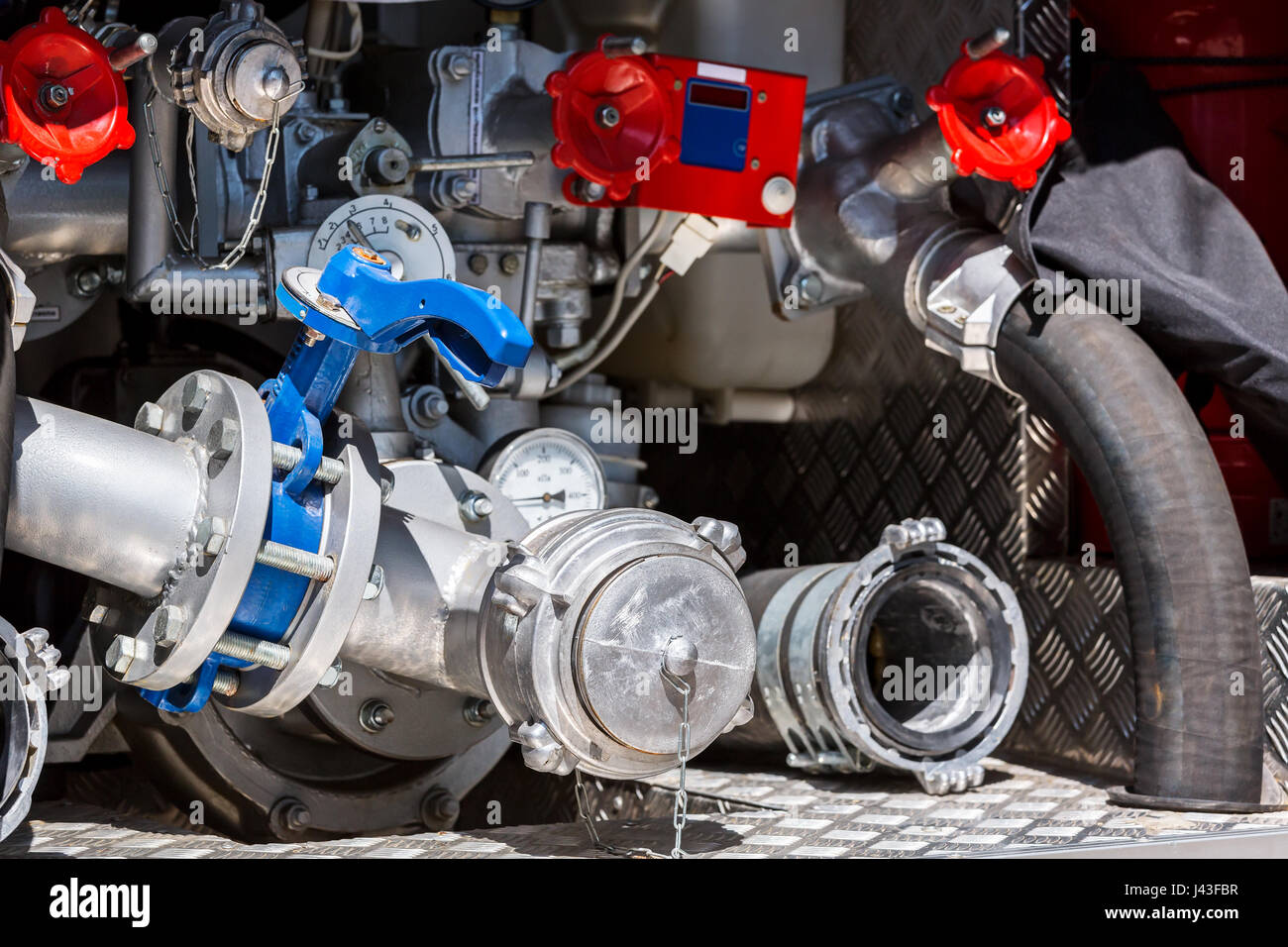 valves, pressure gauges and hoses on rear of fire engine Stock Photo ...