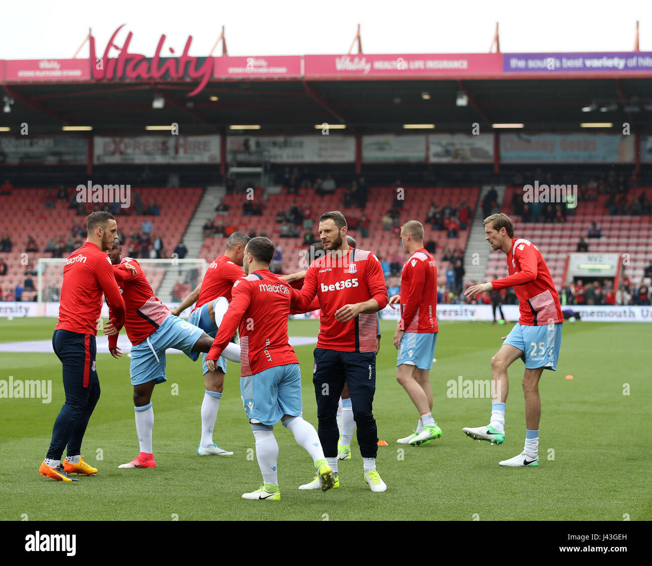 Stoke City players warming up before the game Stock Photo - Alamy