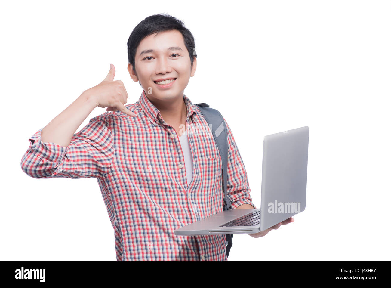 Portrait of young male asian student holding laptop Stock Photo - Alamy