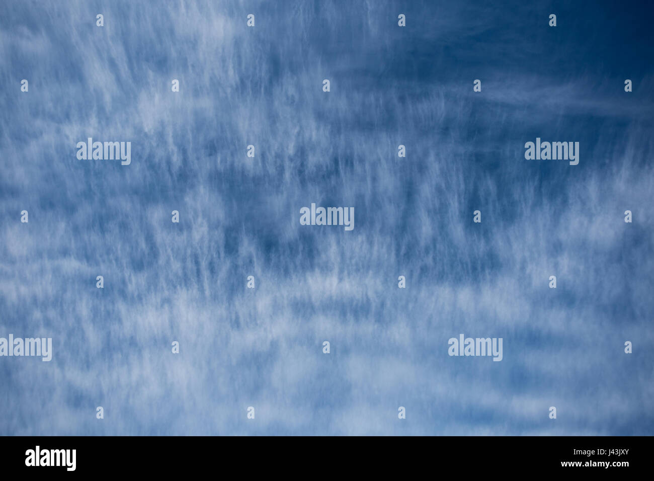 Blue sky with white clouds in waterfall shape. Sky daylight. Natural ...