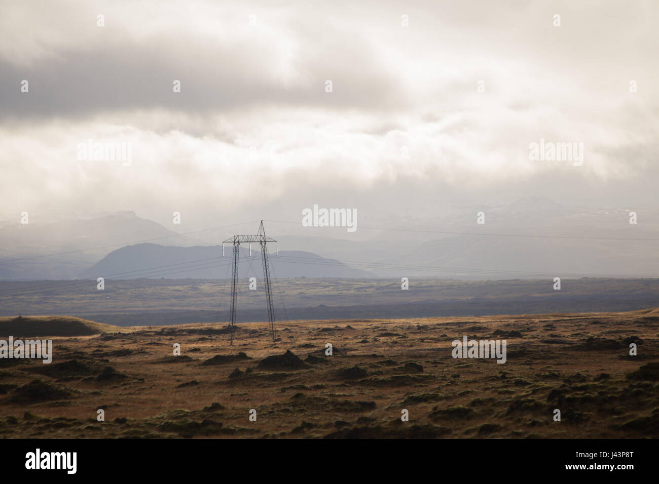 Power pole with sunset in Iceland. Light and shadow over the landscape ...