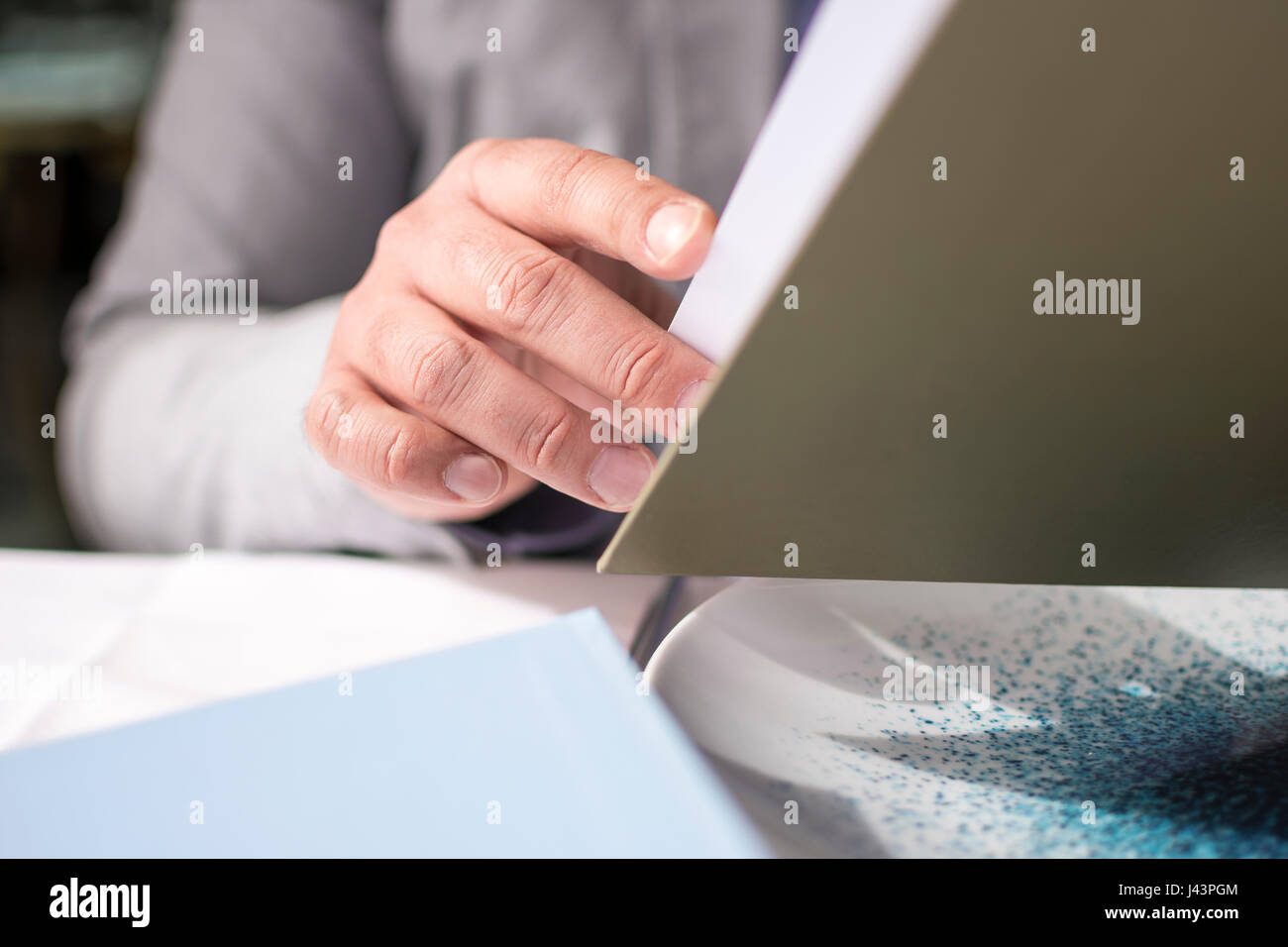 Male Hand Holding Restaurant Menu to Make Order for Lunch Stock Photo ...