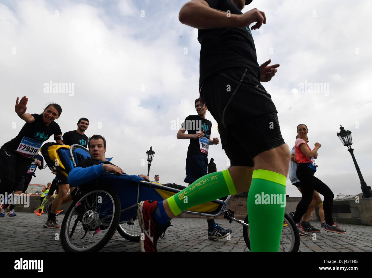 Prague, Czech Republic. 07th May, 2017. Runners cross the Charles ...