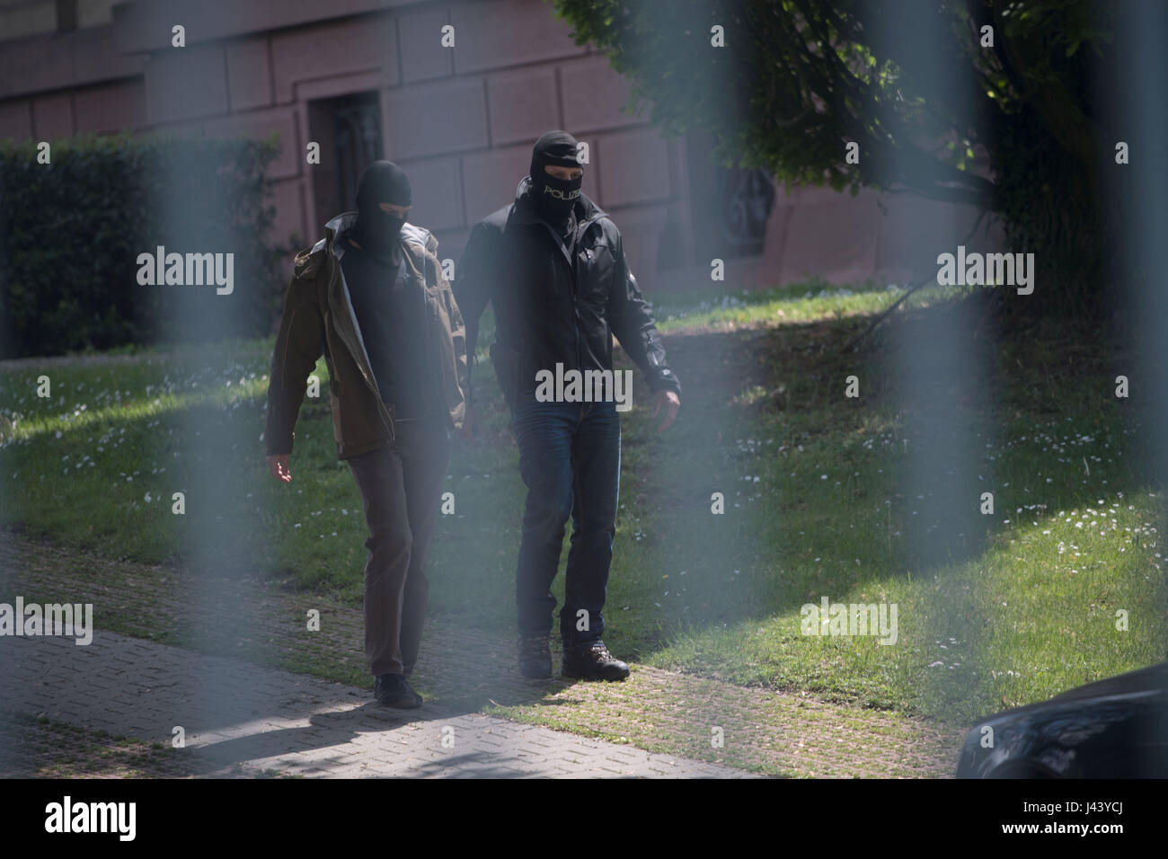 Karlsruhe, Germany. 9th May, 2017. Plainclothed policemen with ski ...