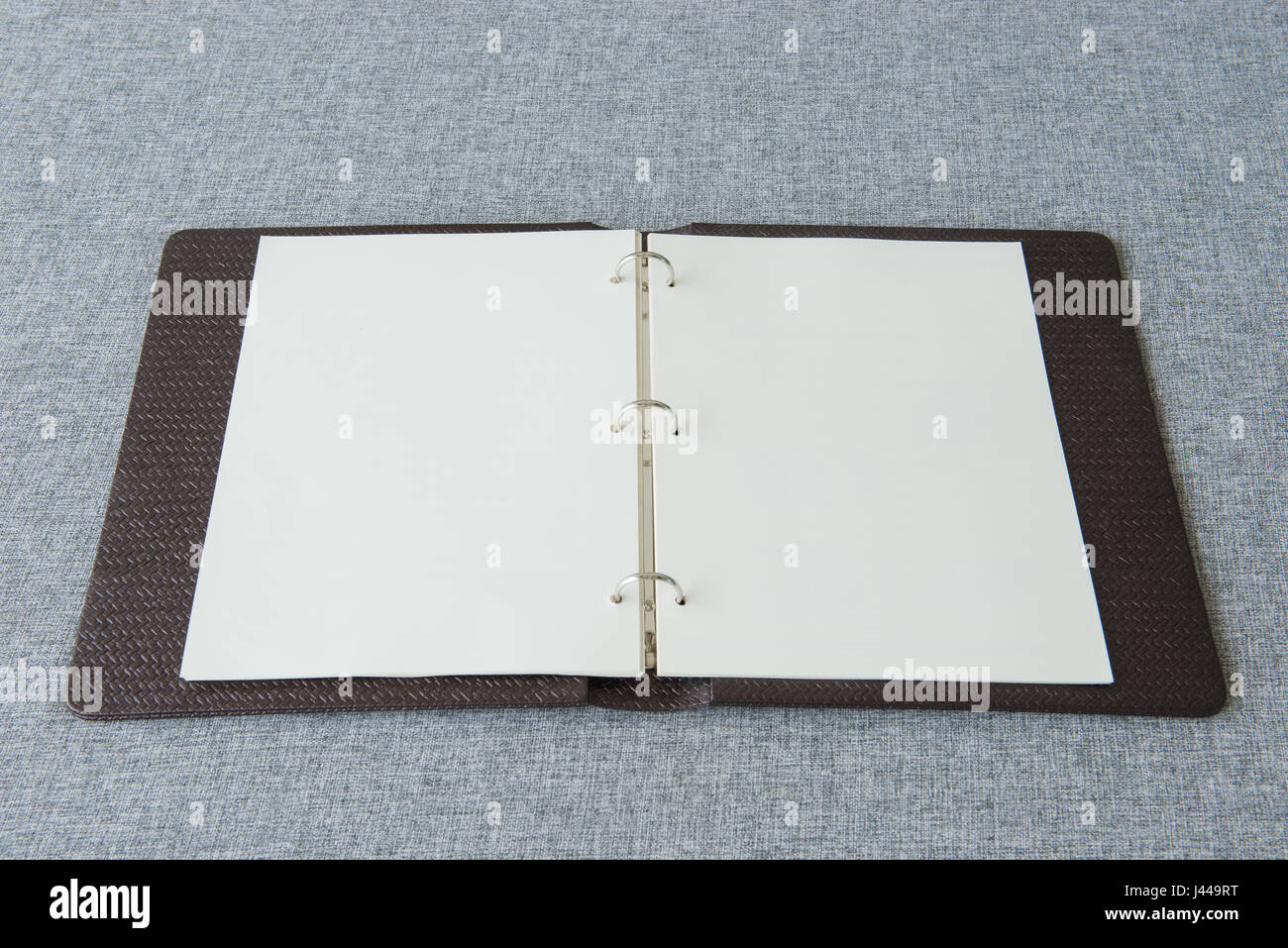 Notebook, Ring binder on fabric background Stock Photo - Alamy