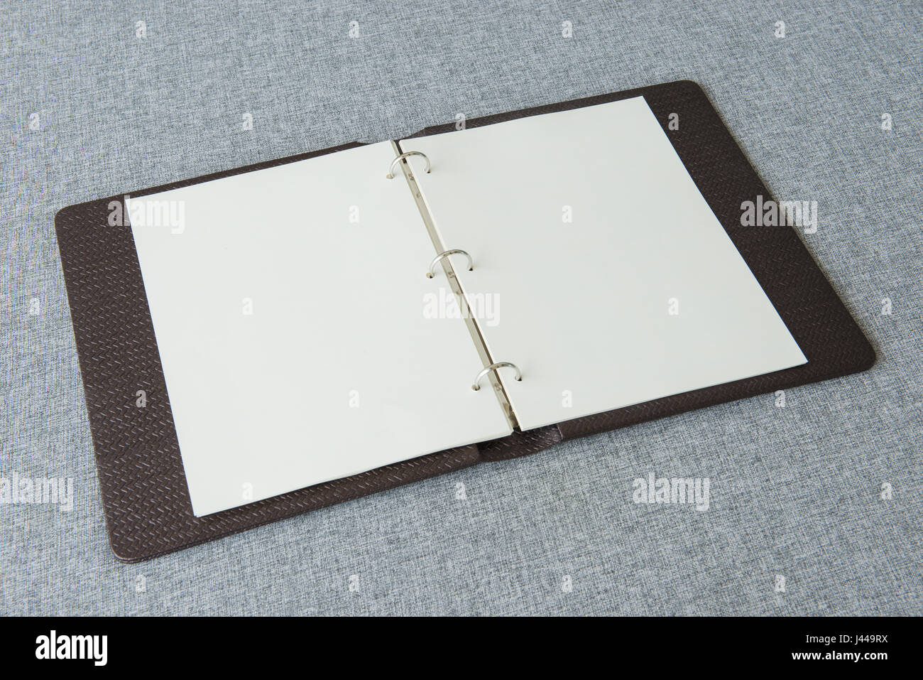 Notebook, Ring binder on fabric background Stock Photo - Alamy