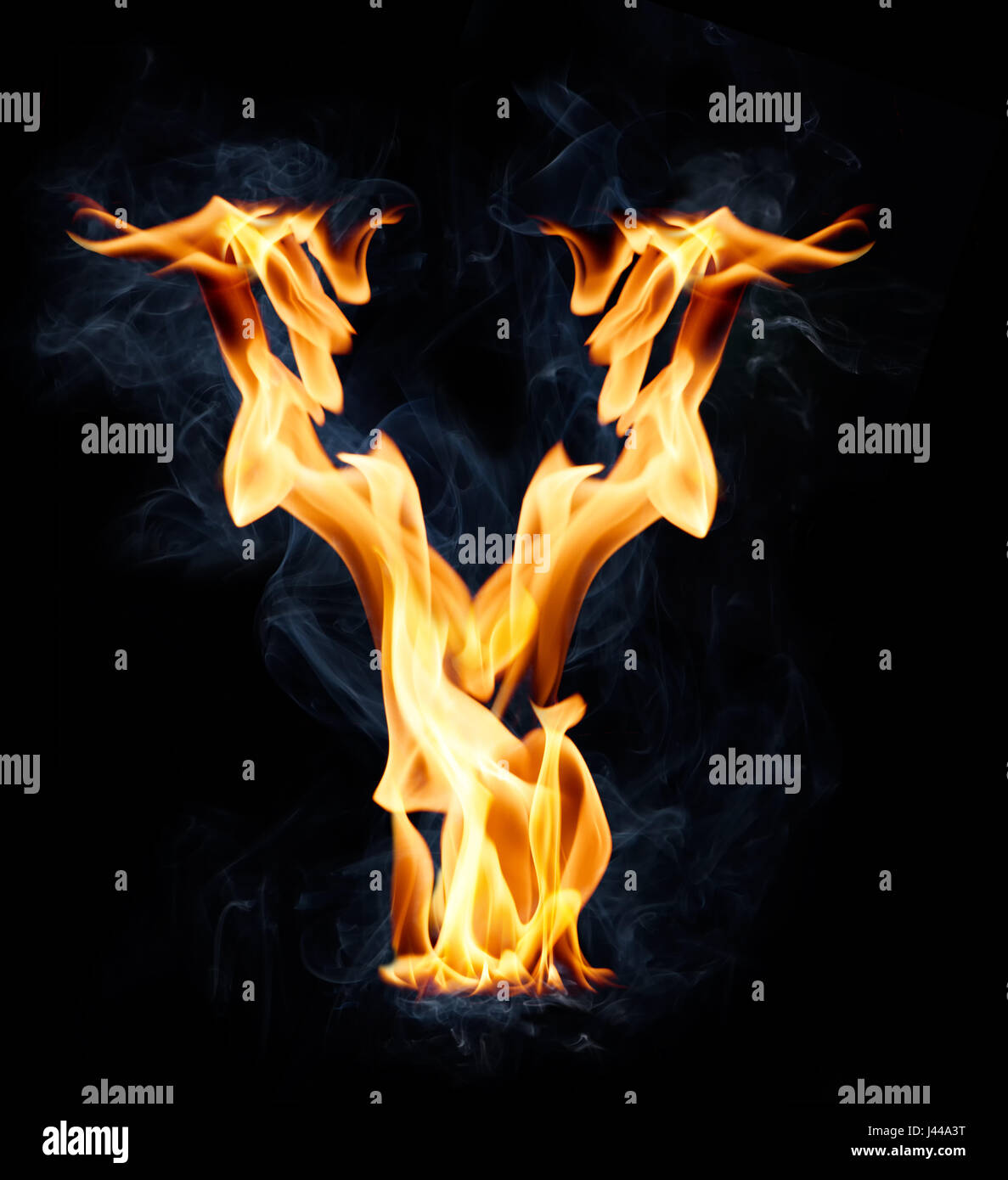 Letter Y. Fire and smoke alphabet over black background Stock Photo - Alamy