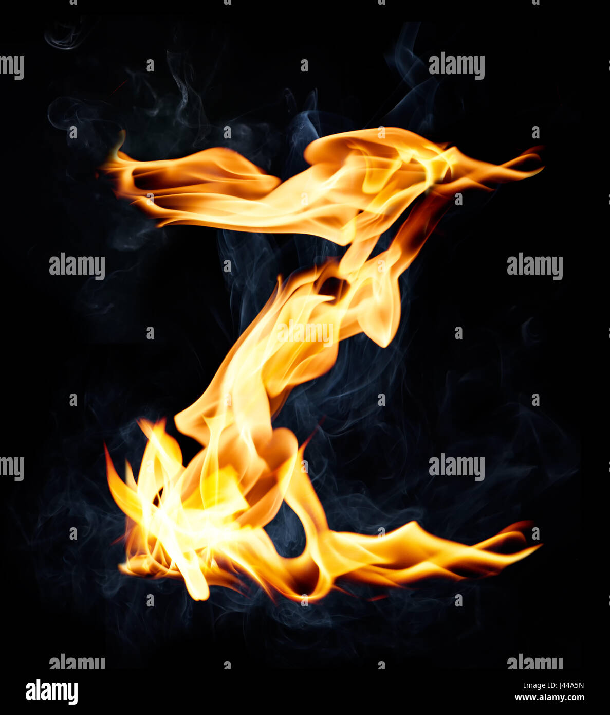 Letter Z. Fire and smoke alphabet over black background Stock Photo - Alamy