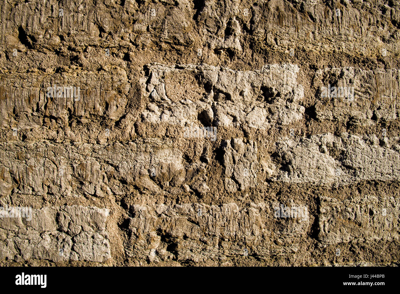 Old decayed stone wall Stock Photo - Alamy
