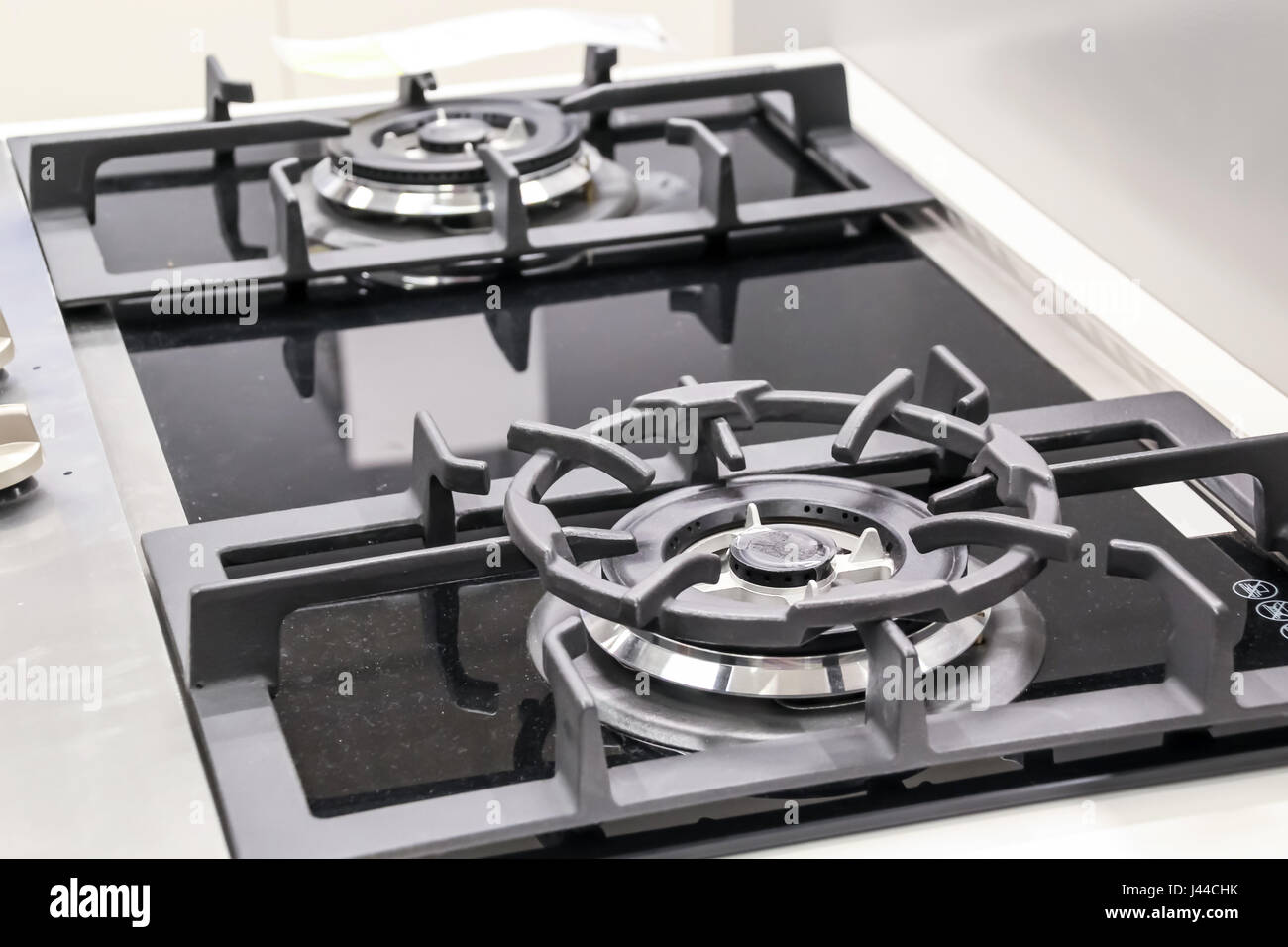 Closed up dual kitchen stoves, cooking concept Stock Photo - Alamy