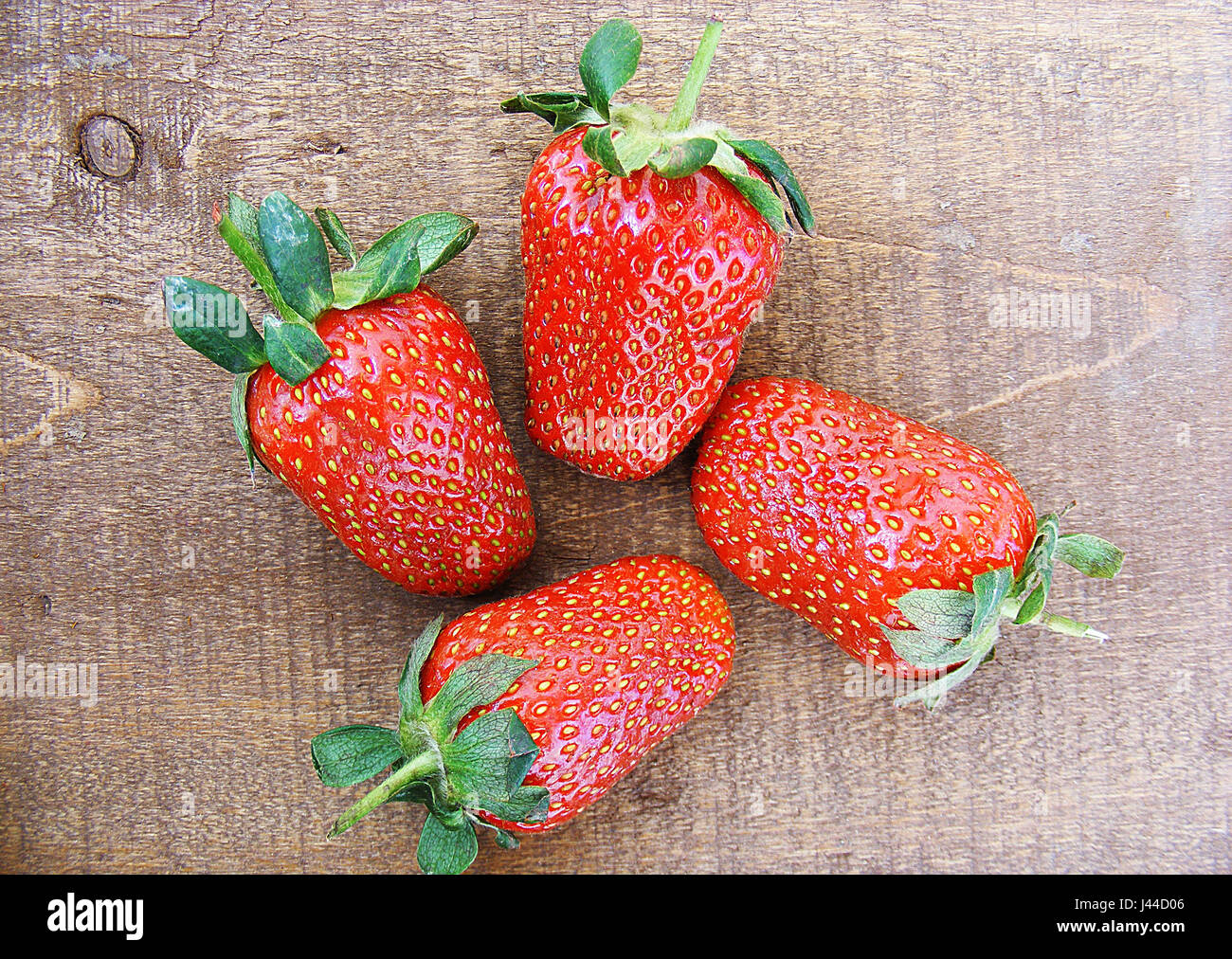 the strawberries on a plate,the most beautiful and appetizing ...