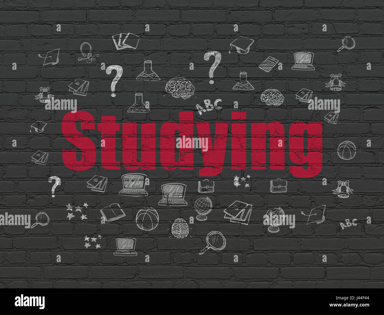 Learning concept: Studying on wall background Stock Photo - Alamy