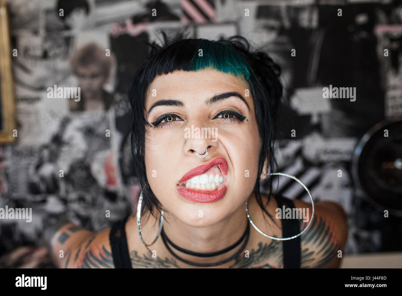 A portrait of a young woman making a face Stock Photo - Alamy