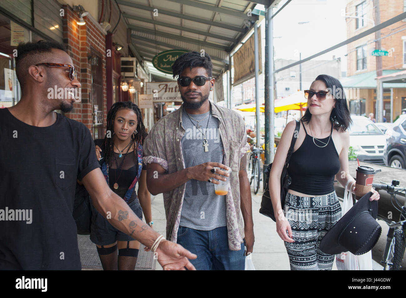 Friends walking down the street hi-res stock photography and images - Alamy
