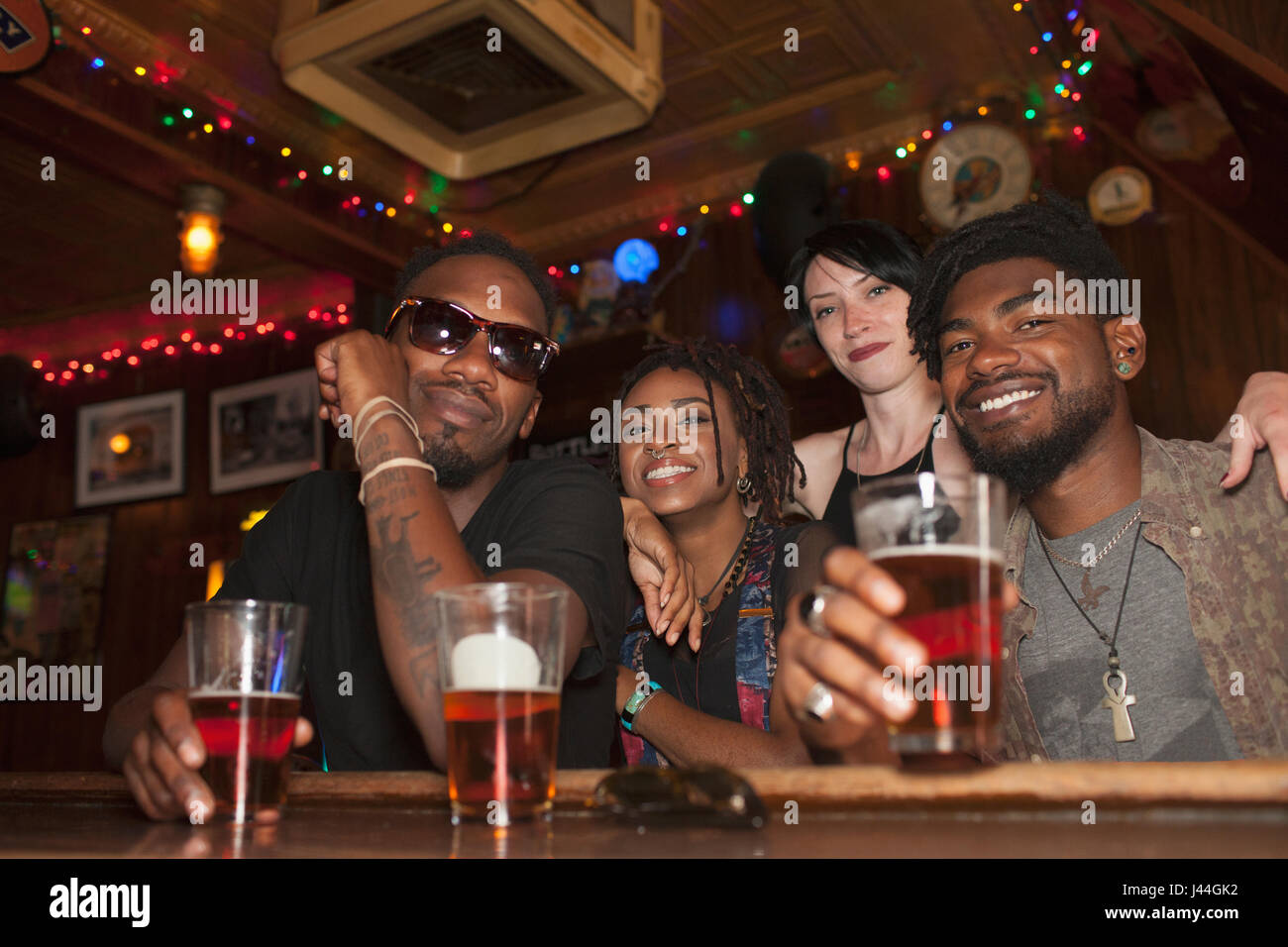 A group of friends at a bar Stock Photo - Alamy