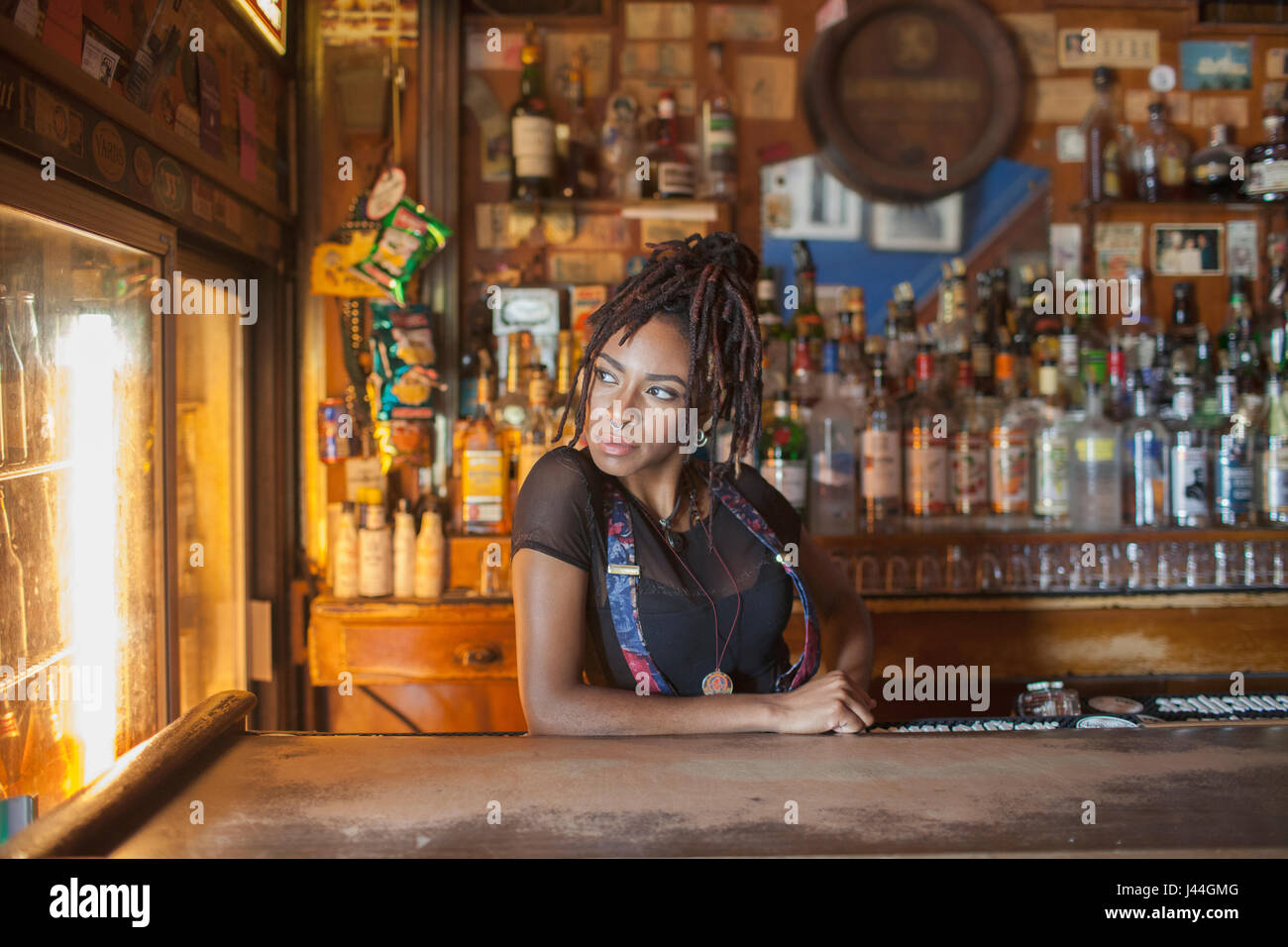 A young woman at a bar Stock Photo - Alamy