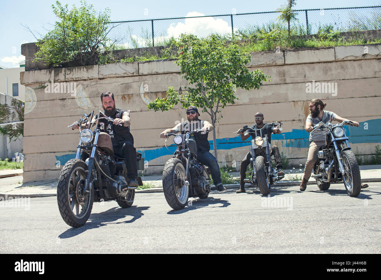 A group of young men on motorcycles Stock Photo - Alamy