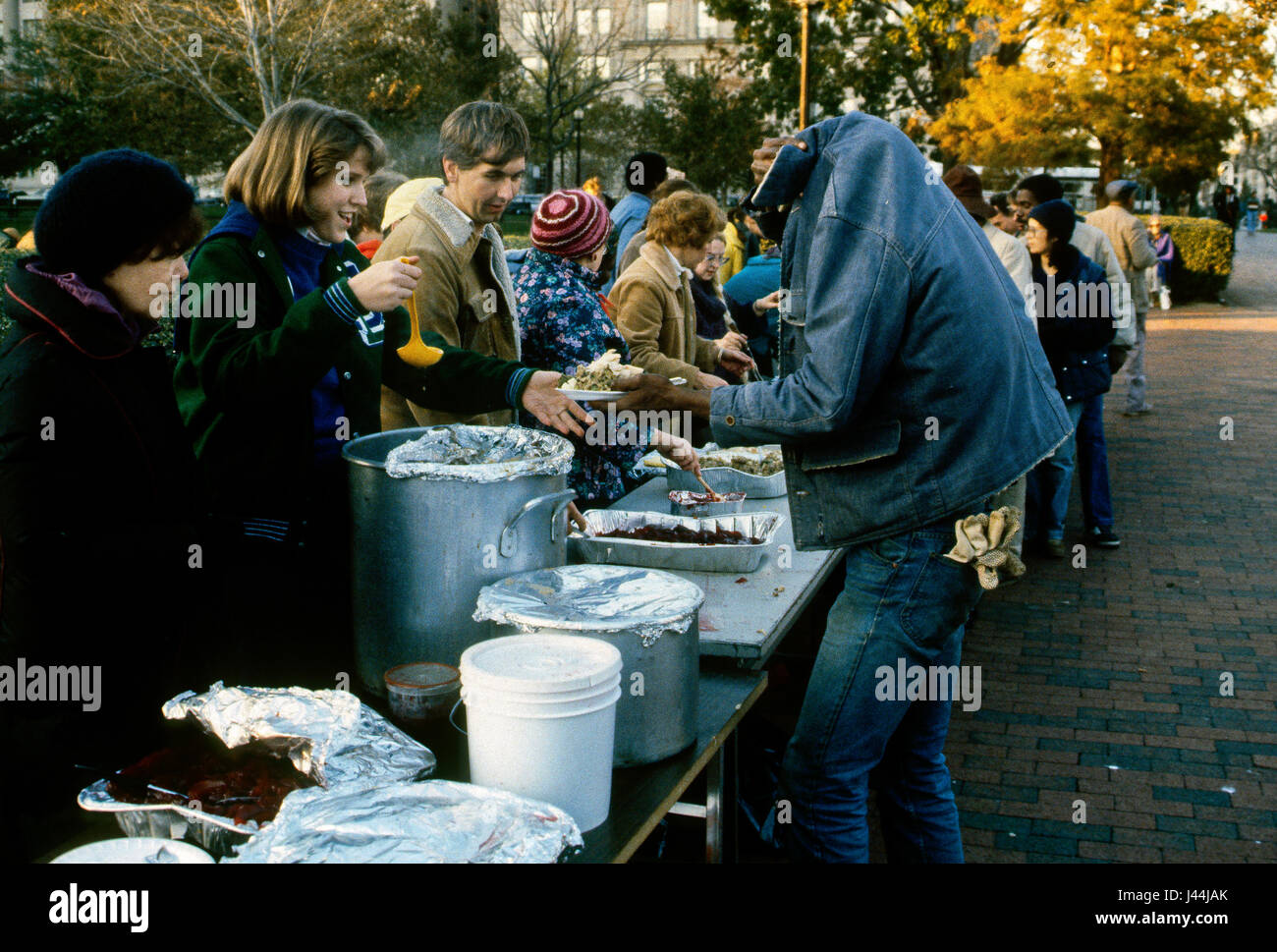 Homeless residents of local shelters are served thanksgiving dinner by ...