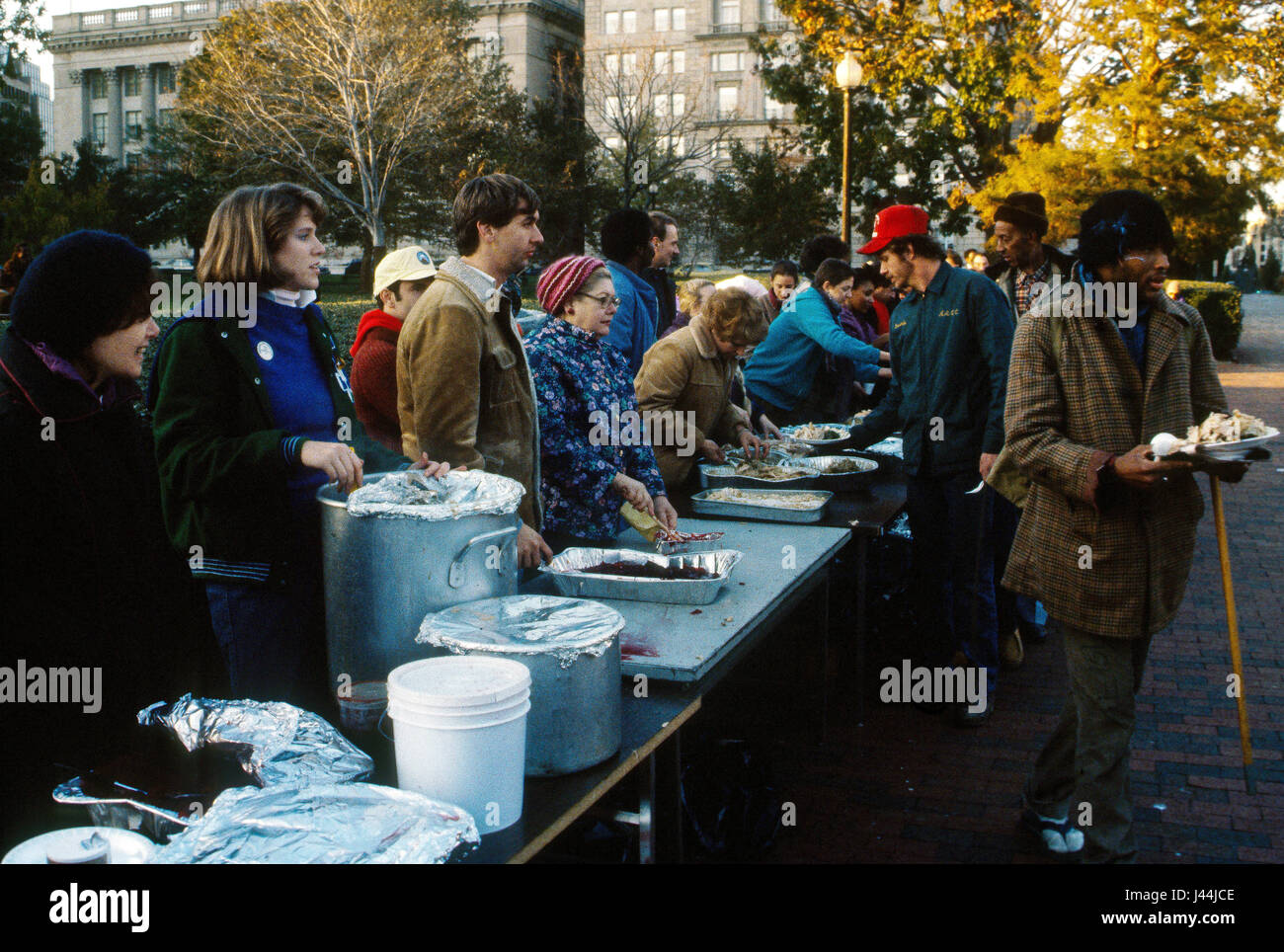 Homeless residents of local shelters are served thanksgiving dinner by ...