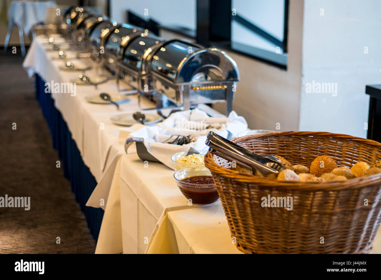 Catering buffet table with delicious food a Assortment of fresh pastry ...