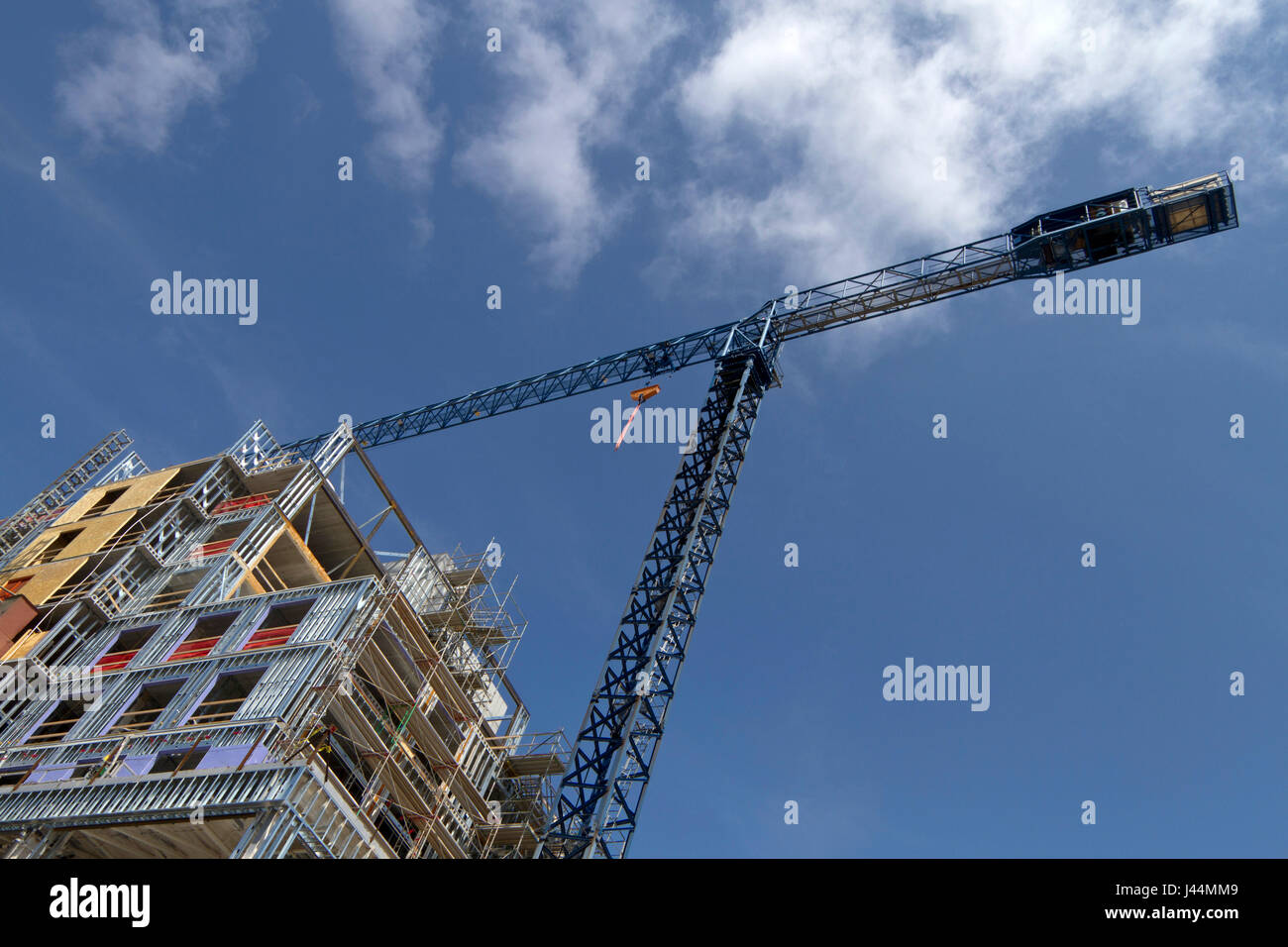 Different perspective looking up at a colorful building construction ...