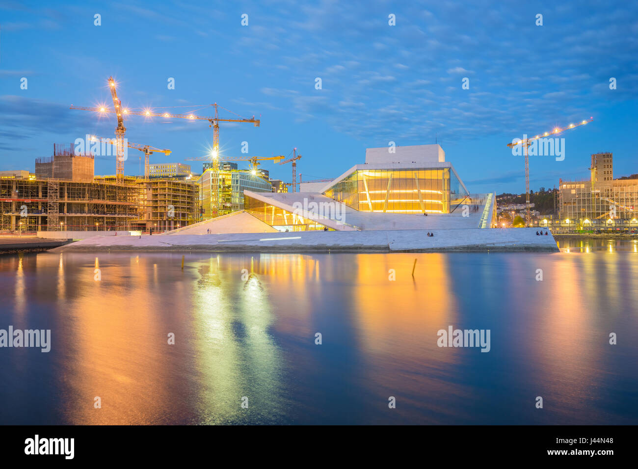 The Oslo Opera House in Oslo city at night in Norway Stock Photo - Alamy