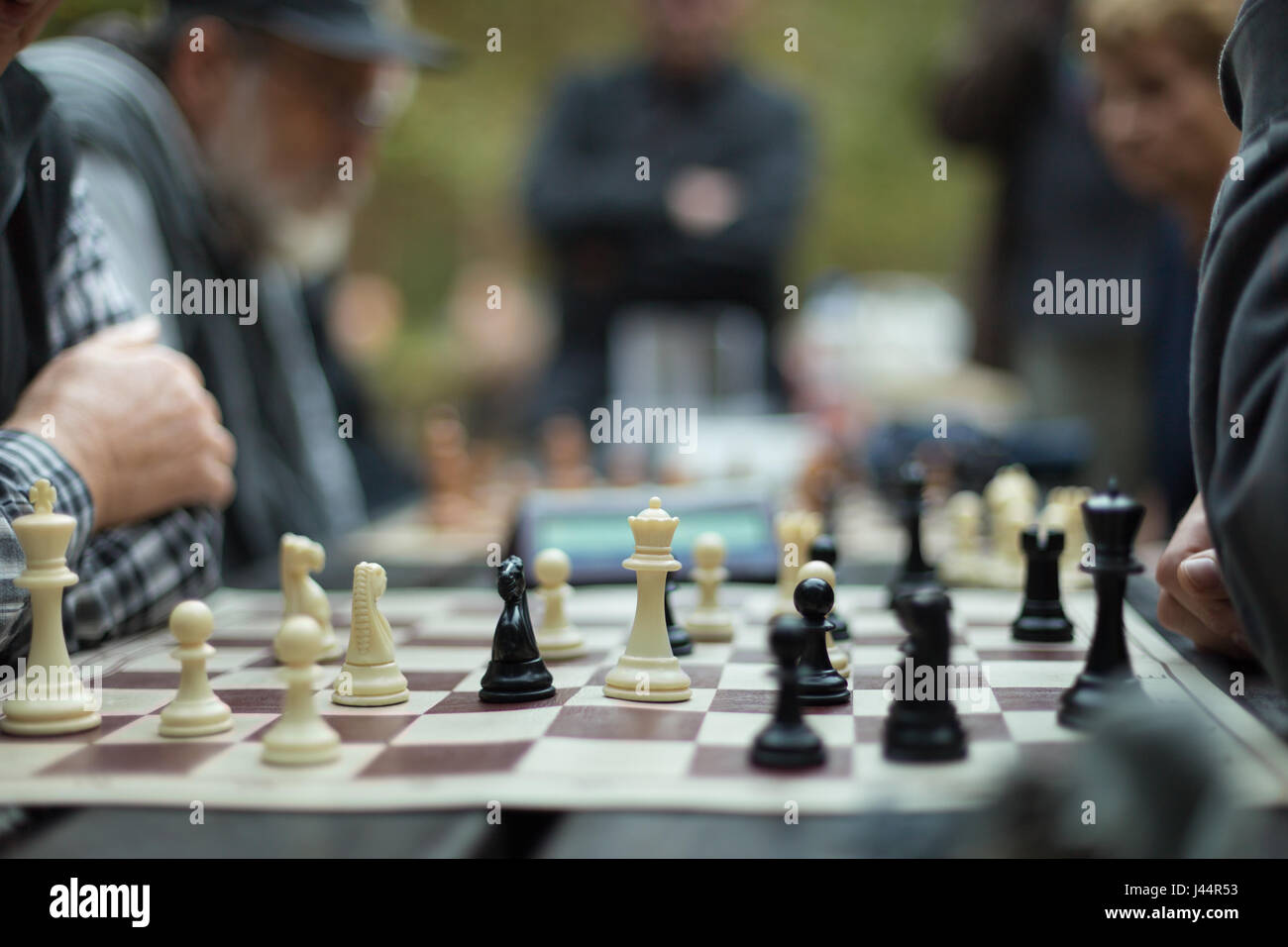 Close up of senior men playing chess Stock Photo - Alamy