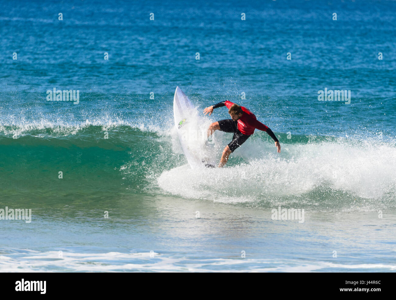 Young male competing in the Werri Slash Surf Competition, Gerringong ...