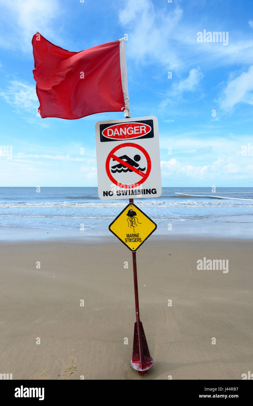 Red flag and no Swimming sign warning about marine stingers on Ellis ...