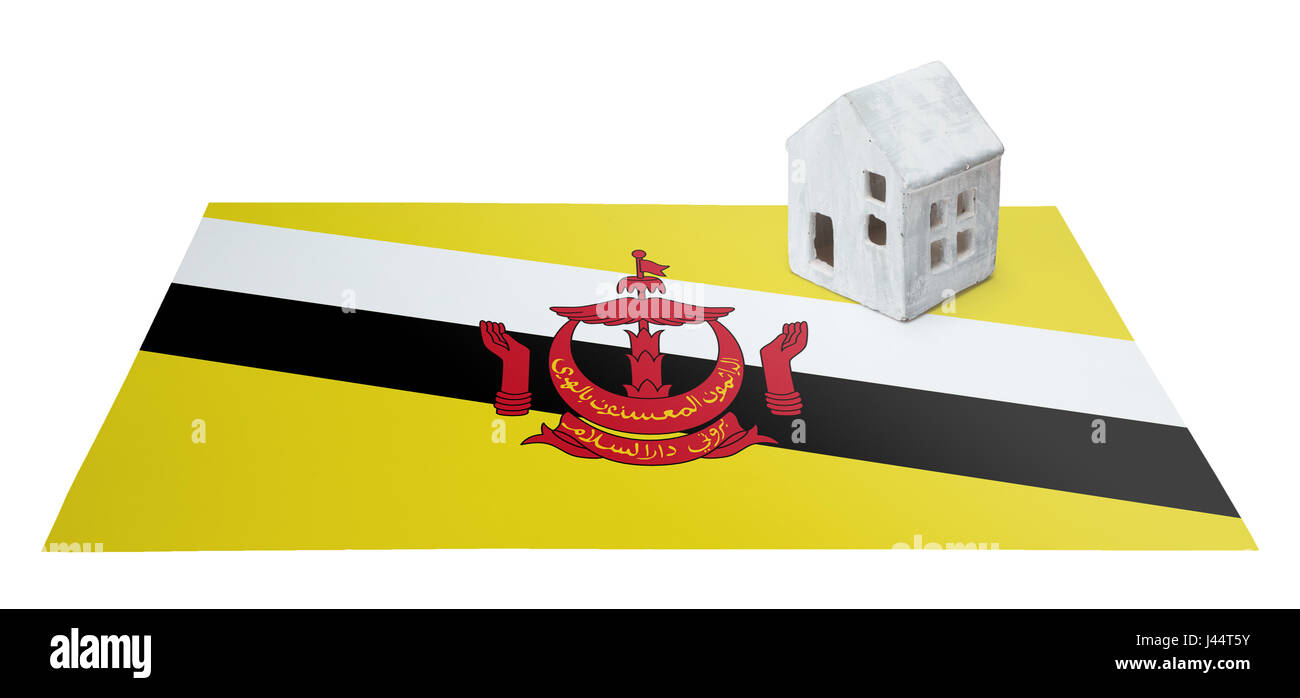 Small house on a flag - Living or migrating to Brunei Stock Photo - Alamy