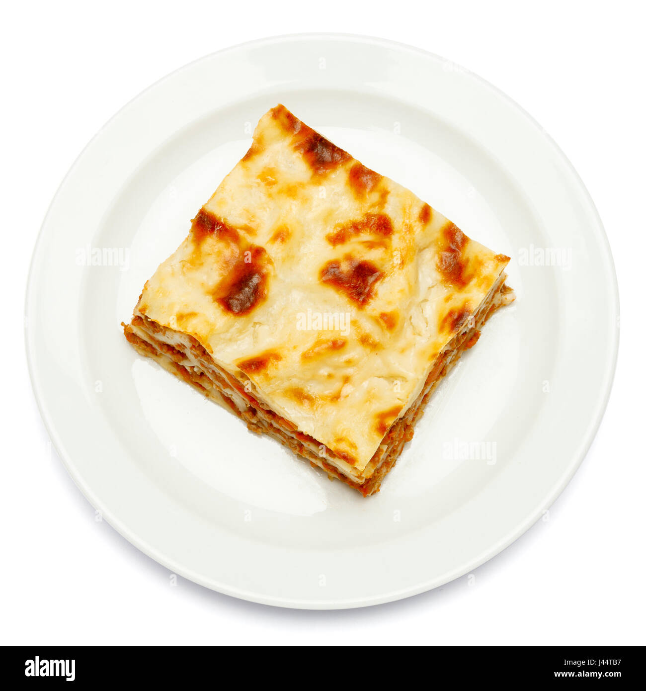 Portion beef lasagne Cut Out Stock Images & Pictures - Alamy