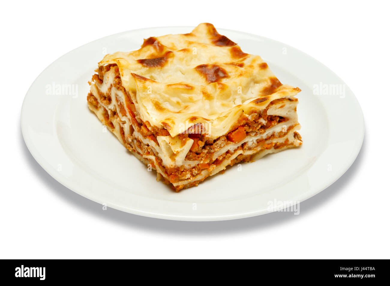 Portion beef lasagne Cut Out Stock Images & Pictures - Alamy