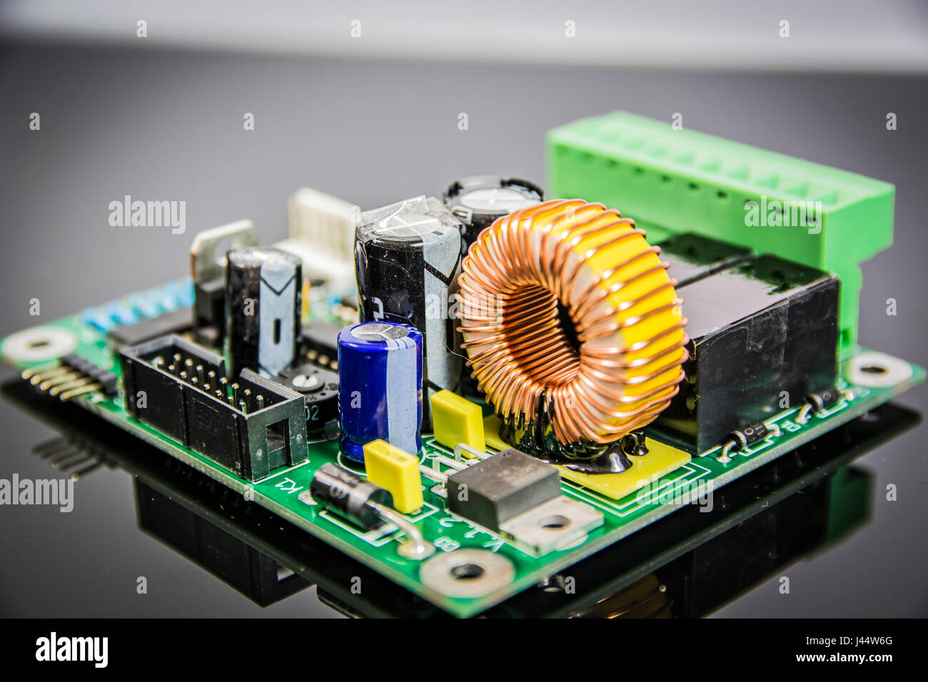 Small electronic board on dark background Stock Photo - Alamy
