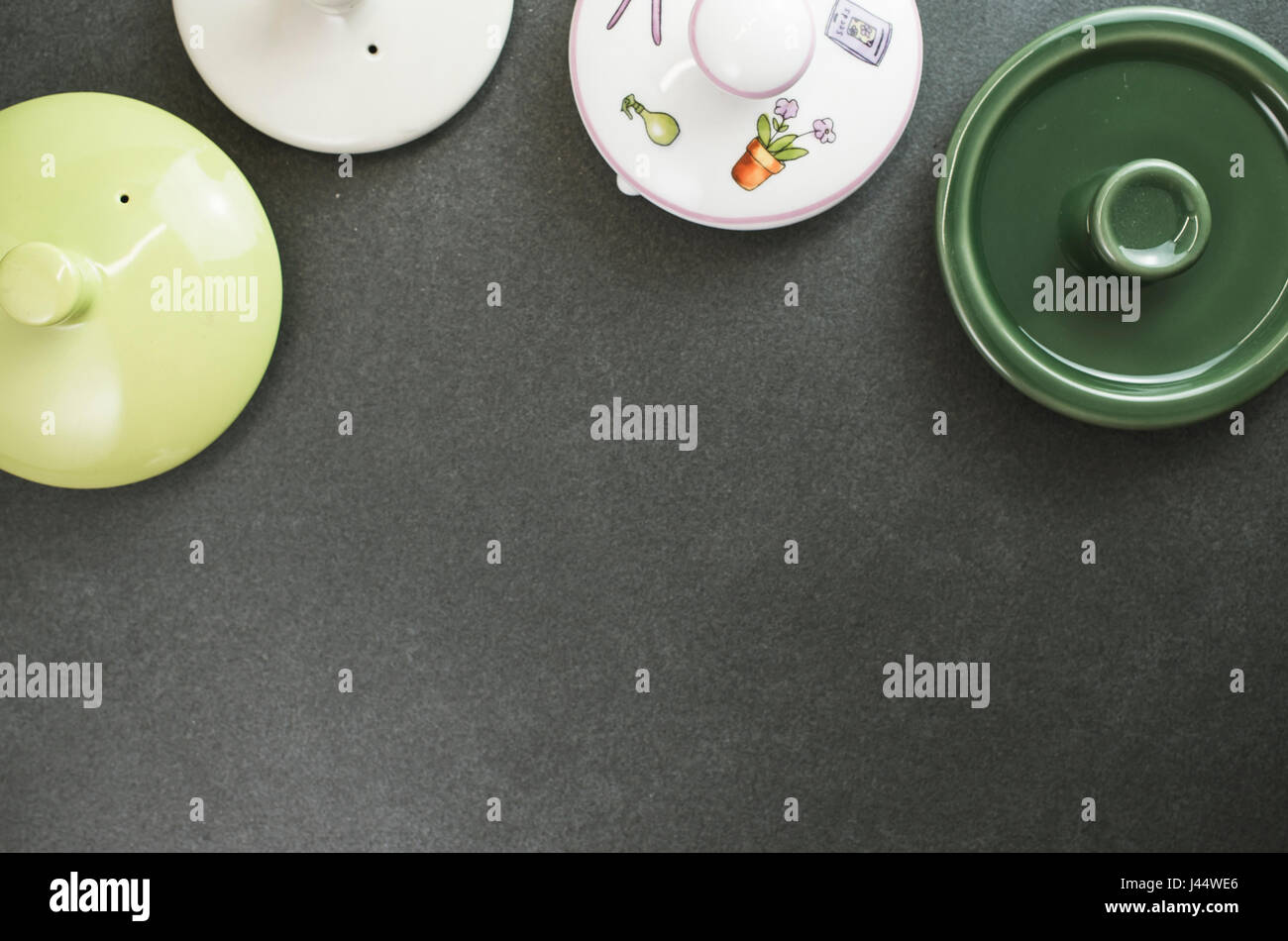 tea pot lids top view - copy space Stock Photo - Alamy