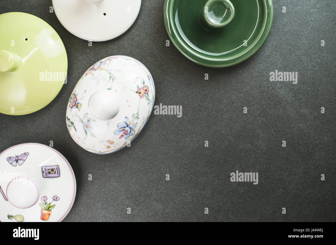 tea pot lids top view - copy space Stock Photo - Alamy