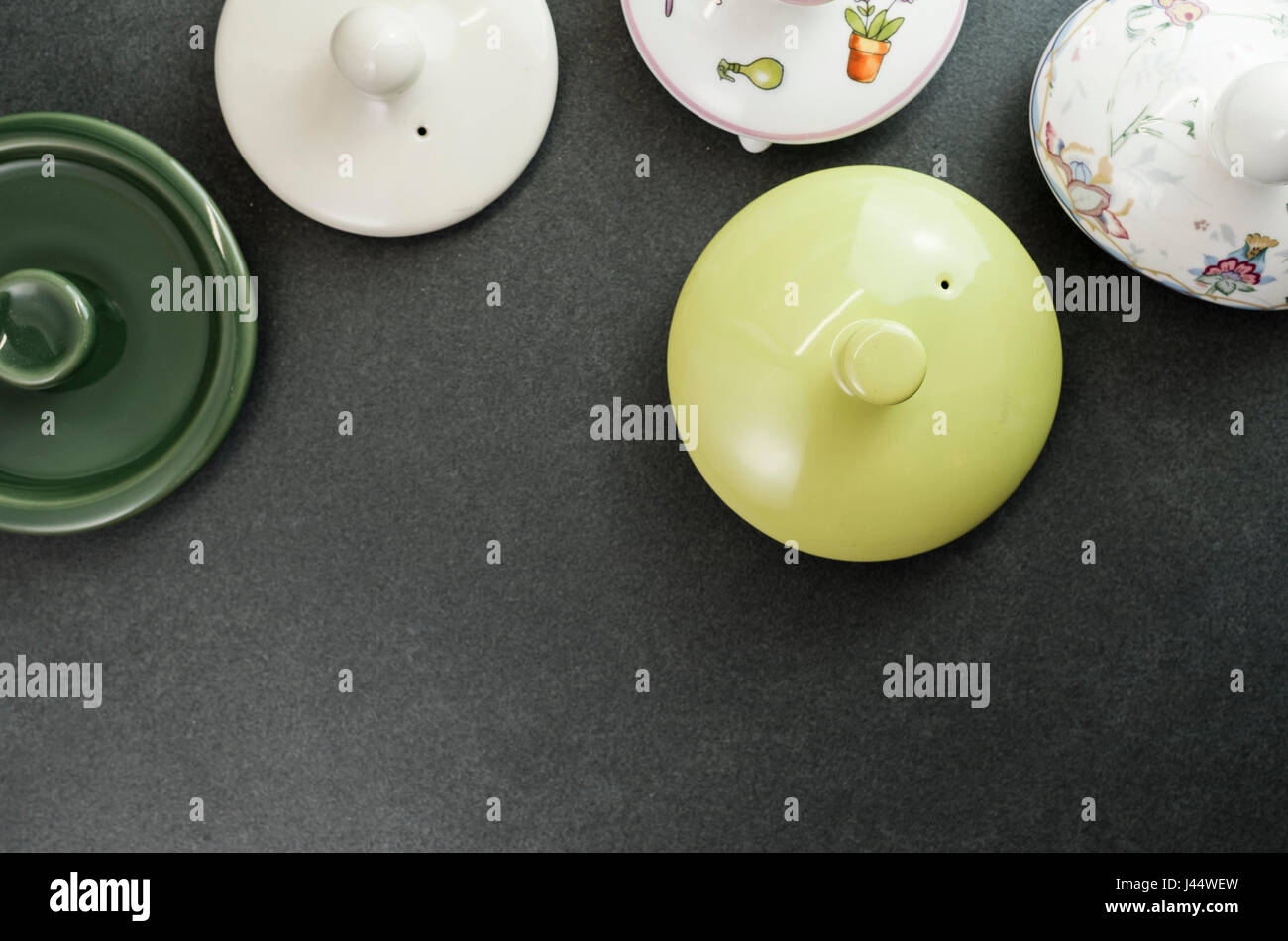 tea pot lids top view - copy space Stock Photo - Alamy