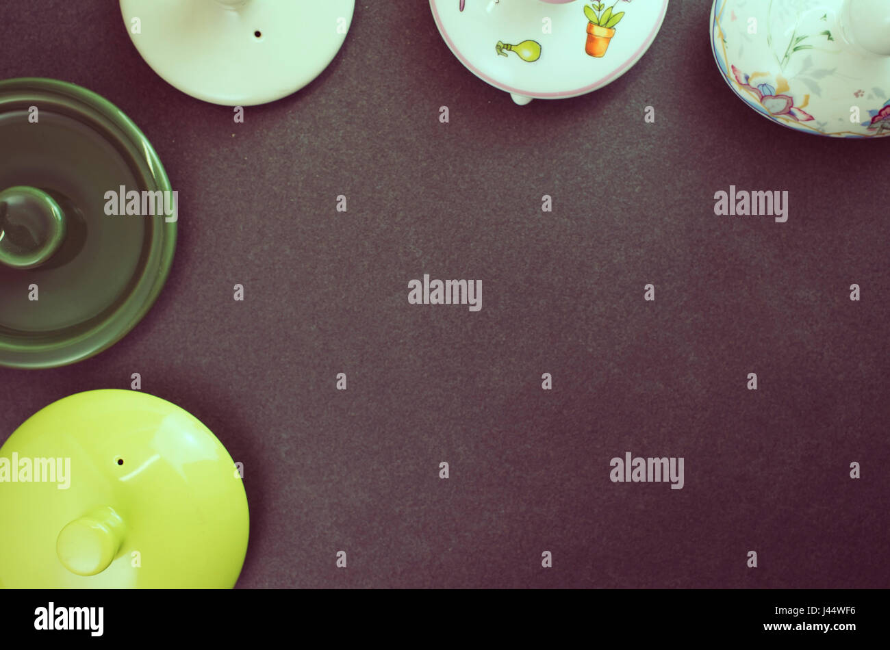 tea pot lids top view - copy space Stock Photo - Alamy