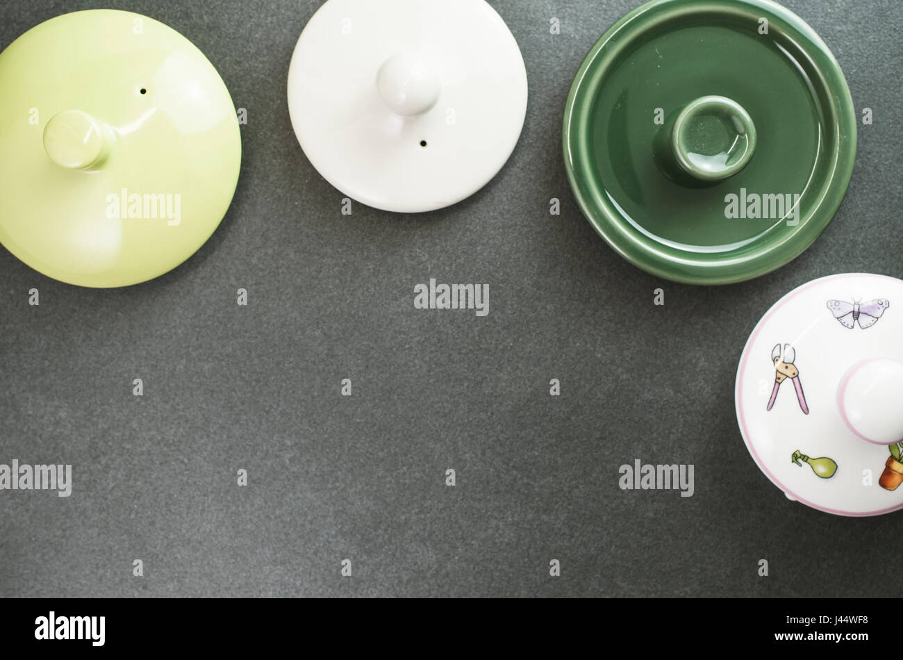 tea pot lids top view - copy space Stock Photo - Alamy