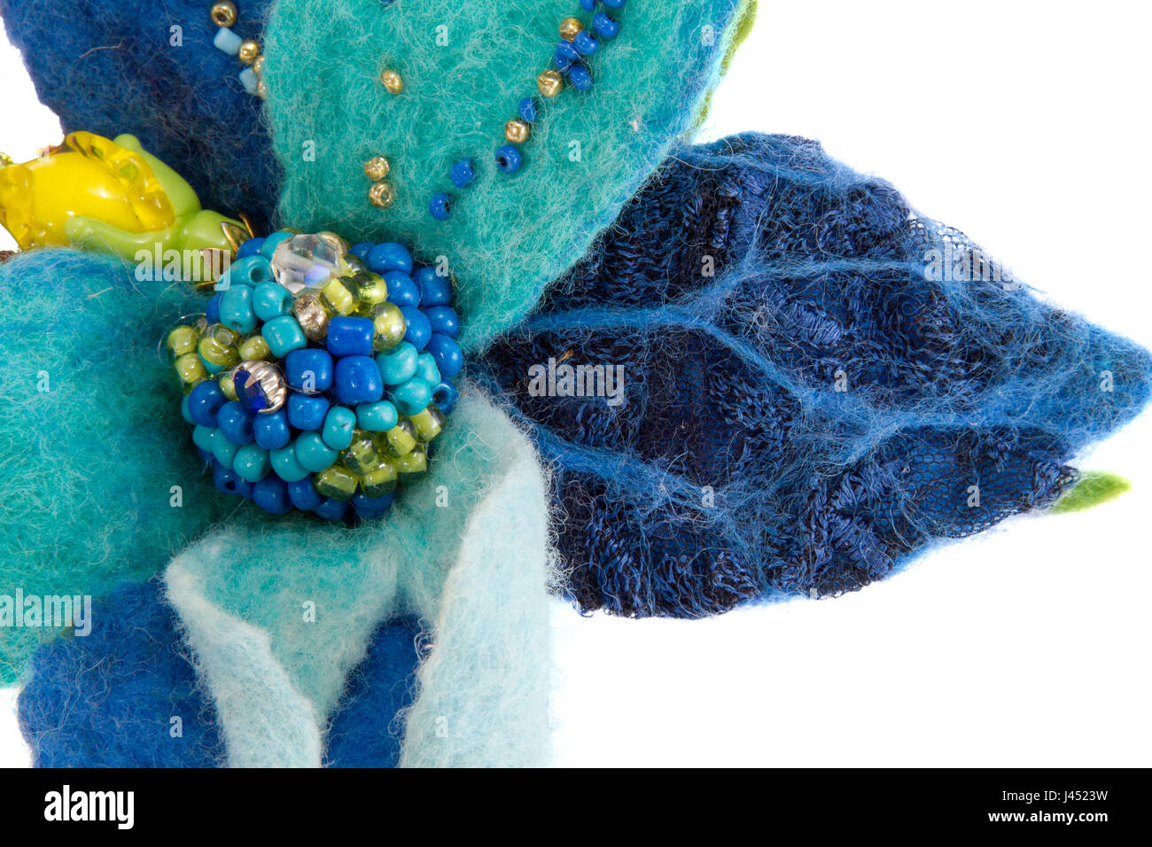 a decorative blue flower made from wool Stock Photo - Alamy