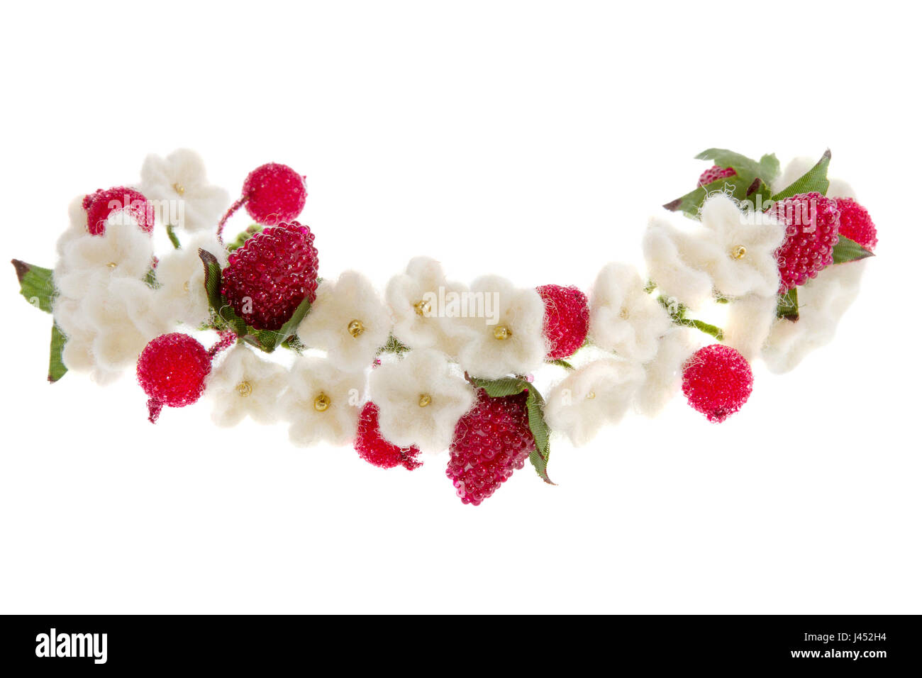 a wreath white flowers cherry and red raspberry Stock Photo - Alamy