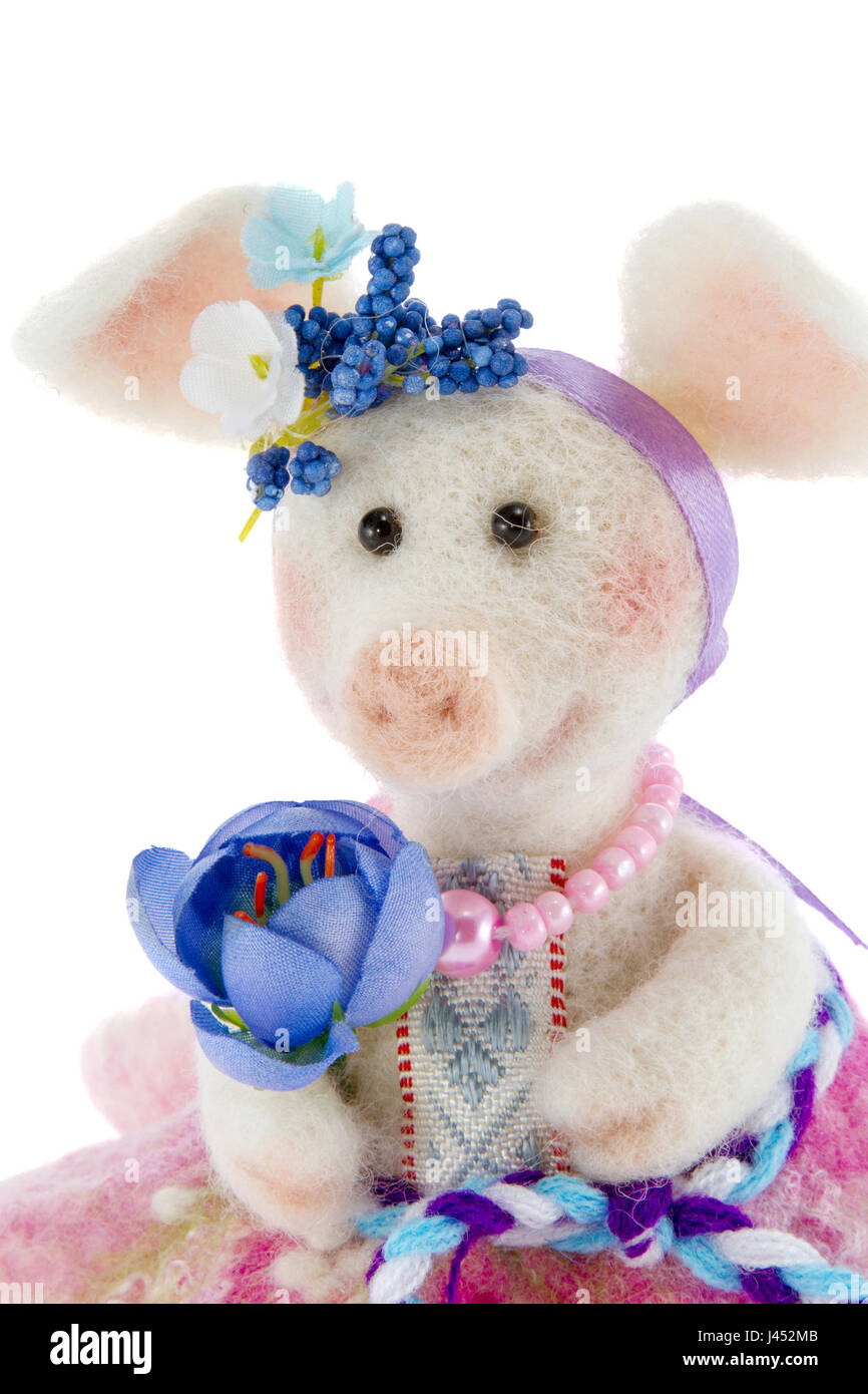 a White toy pig in a pink skirt Stock Photo - Alamy