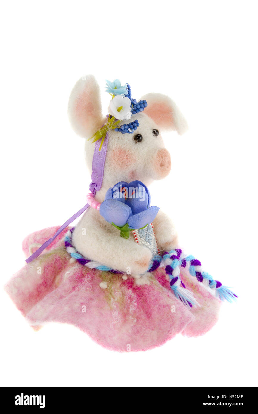 a White toy pig in a pink skirt Stock Photo - Alamy