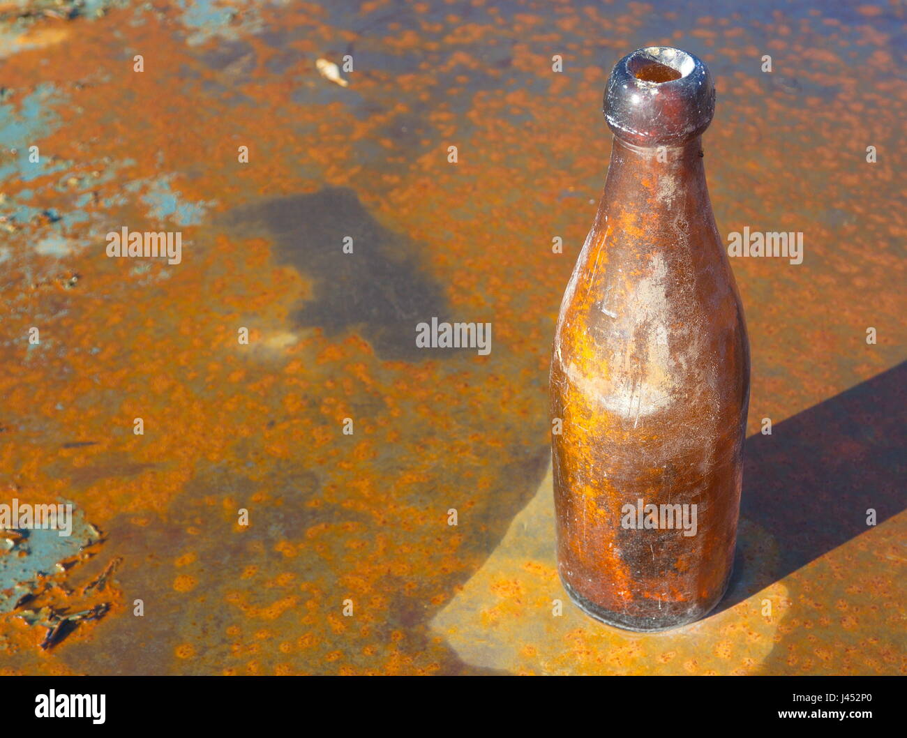 Old dusty damaged bottle hi-res stock photography and images - Alamy