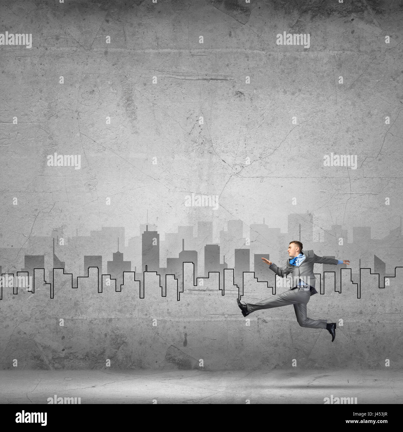 Businessman jumping high Stock Photo - Alamy