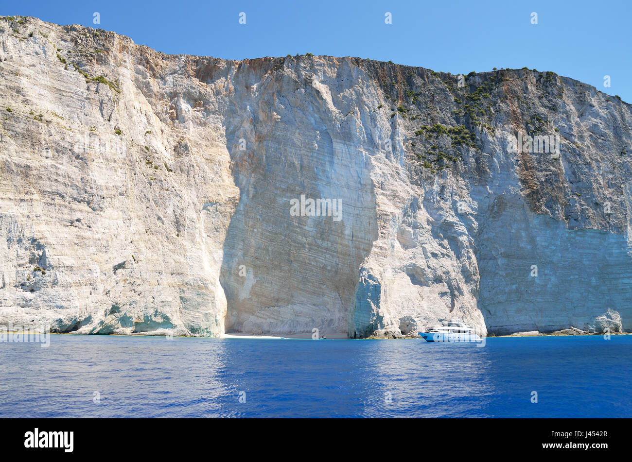 Coast cliff scenery with deep blue waters at Zakynthos coastline Stock ...
