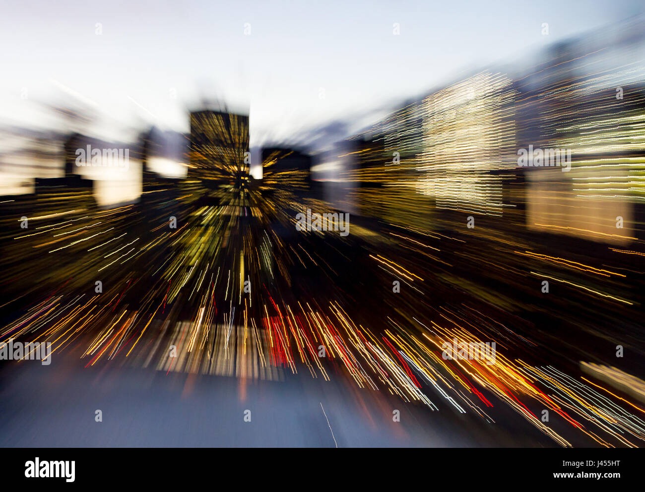 Abstract blurred lines of New York City downtown skyline lights at dusk ...